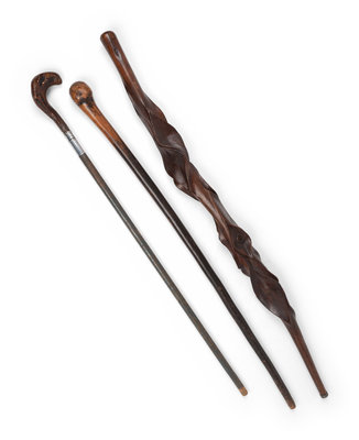 Three Carved Walnut Walking Sticks Lot 520