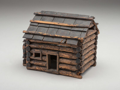 [LINCOLN, Abraham (1809-1865)]. Folk art log cabin depicting Abraham ...