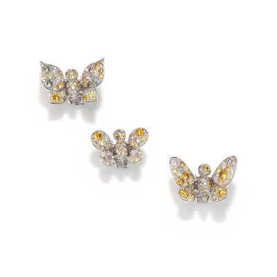 COLLECTION OF DIAMOND AND COLORED DIAMOND BUTTERFLY HAIR CLIPS Lot 384