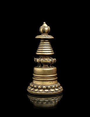 A Small Tibetan Bronze Pala-Style Model of a Stupa Lot 289
