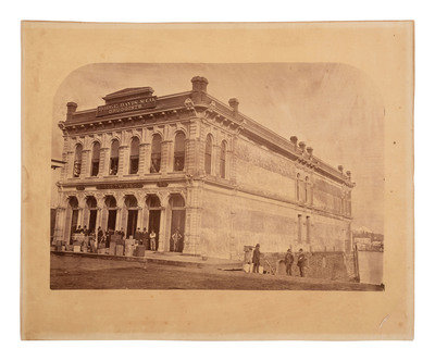 [EARLY PHOTOGRAPHY]. 2 large format photographs of storefronts, incl ...