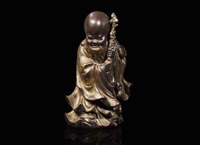 An unusual Chinese porcelain faux bronze "Shoulao" figural censer ...