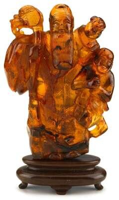 Chinese amber figural group Lot 339